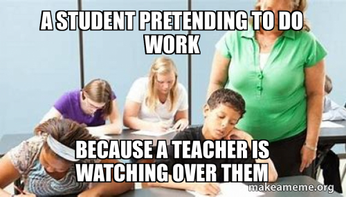 A student Pretending to do work Because a Teacher is watching over them ...