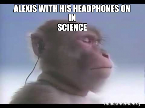 Alexis with his headphones on in science Meme Generator