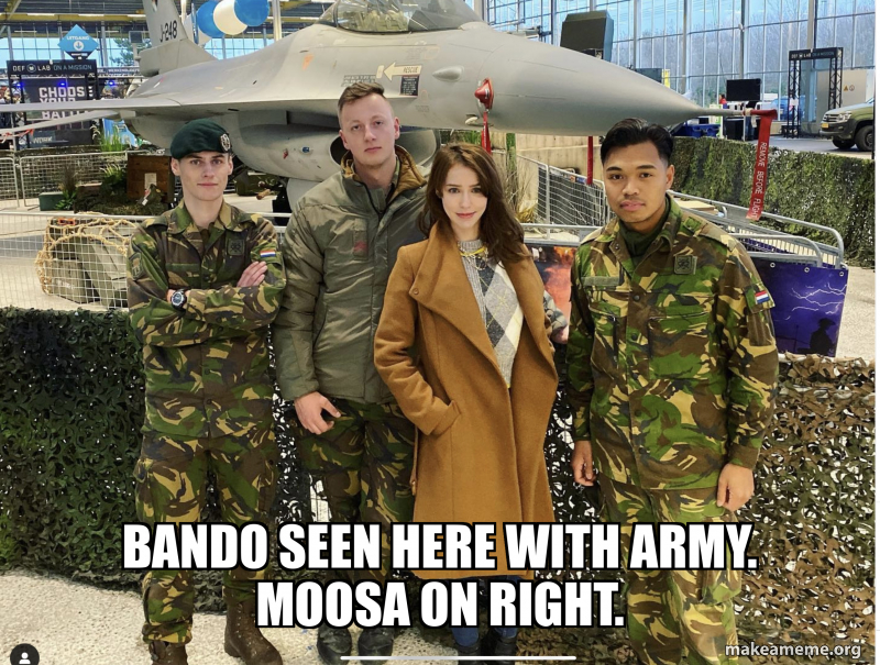 Bando seen here with army. Moosa on right. Meme Generator