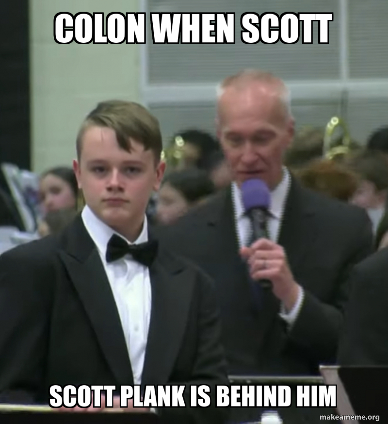 Colon when scott Scott plank is behind him Meme Generator