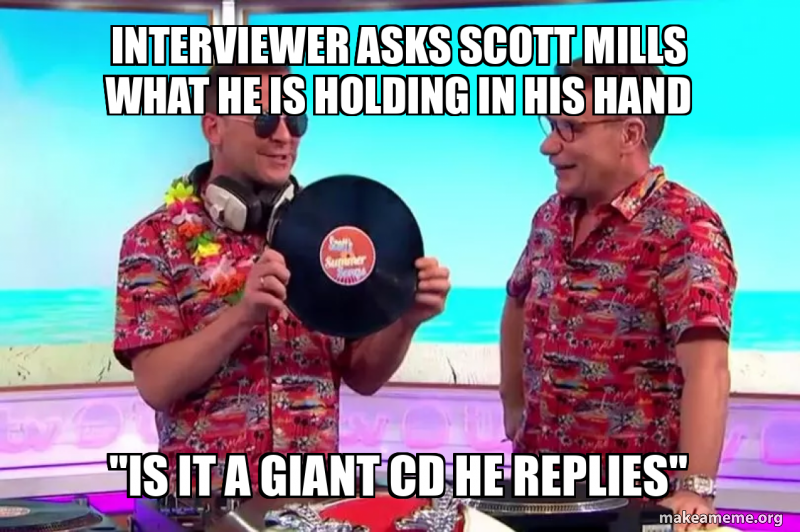 Interviewer asks scott mills what he is holding in his hand "is it a ...