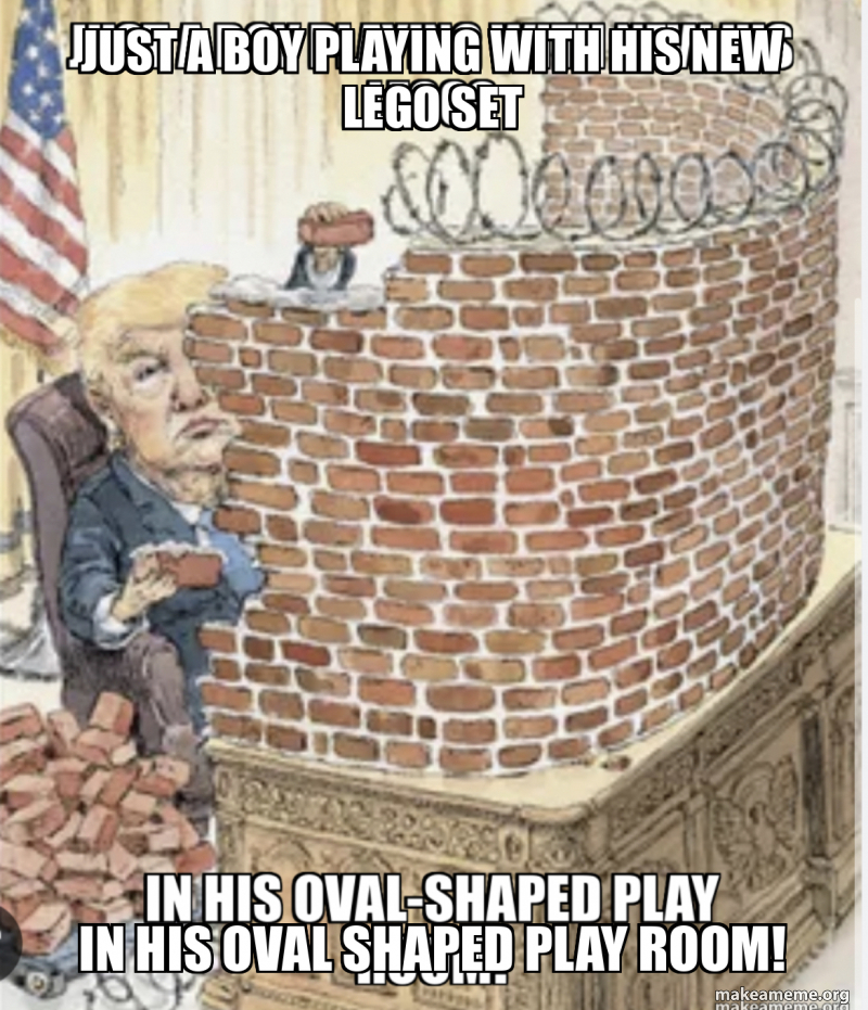 Just a boy playing With his new lego set In his oval shaped Play room ...