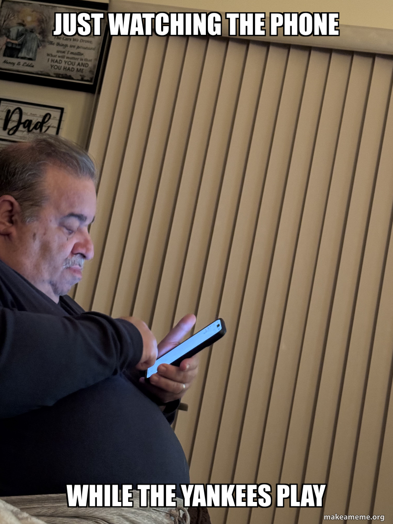 Just watching the phone While the yankees play Meme Generator