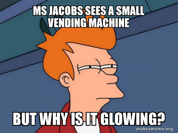 Ms Jacobs sees a small vending machine But why is it glowing ...