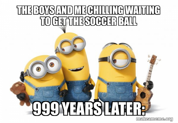 the boys and me chilling waiting to get the soccer ball 999 years later ...