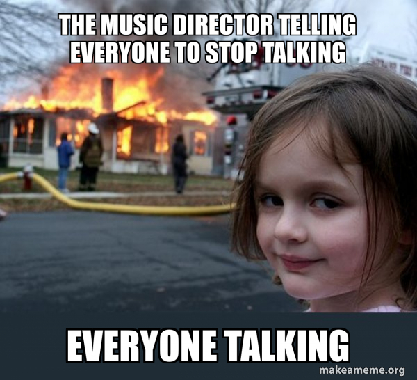 the music director telling everyone to stop talking everyone talking ...