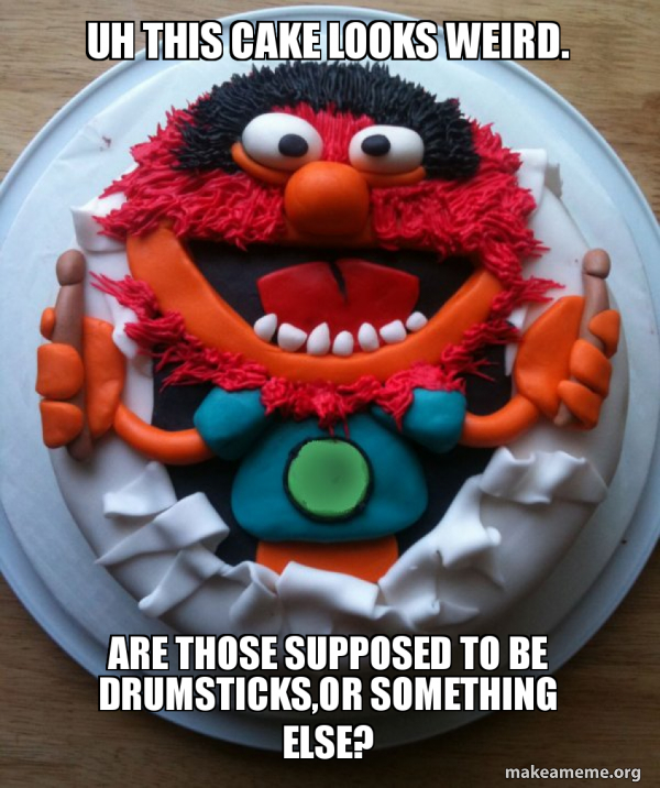 Uh this cake looks weird. Are those supposed to be drumsticks,Or ...