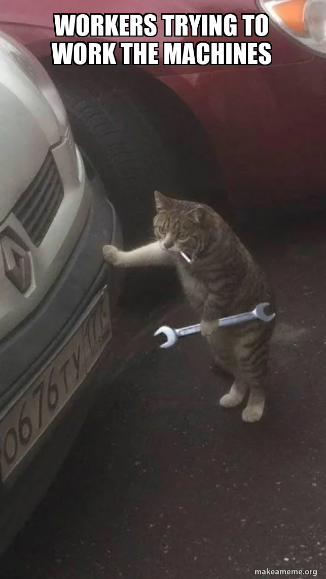 workers trying to work the machines - Mechanic Cat Meme Generator